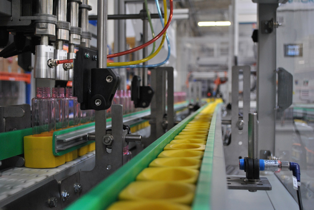 New puck lines for packaging automation, all bottles’ shapes conveyed ...